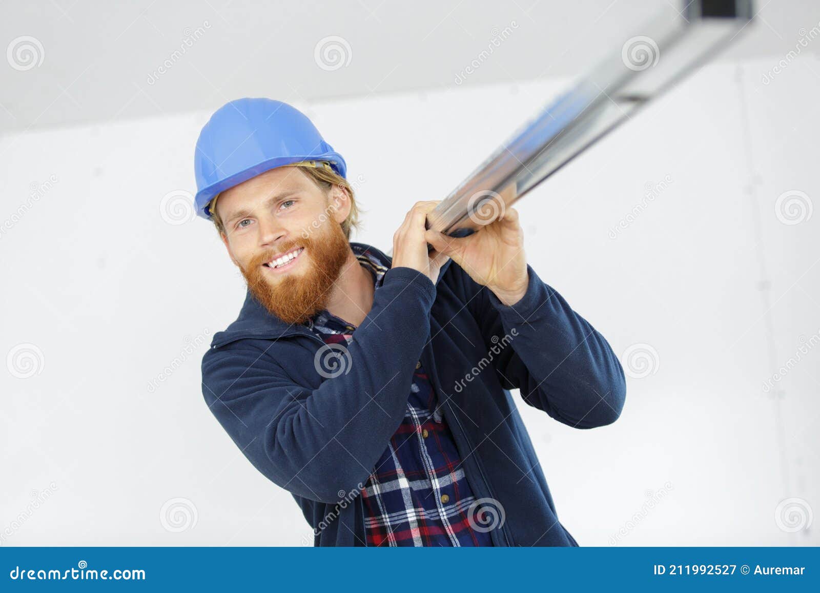 Workman Carrying Metal Frame on Shoulder Stock Image - Image of working ...