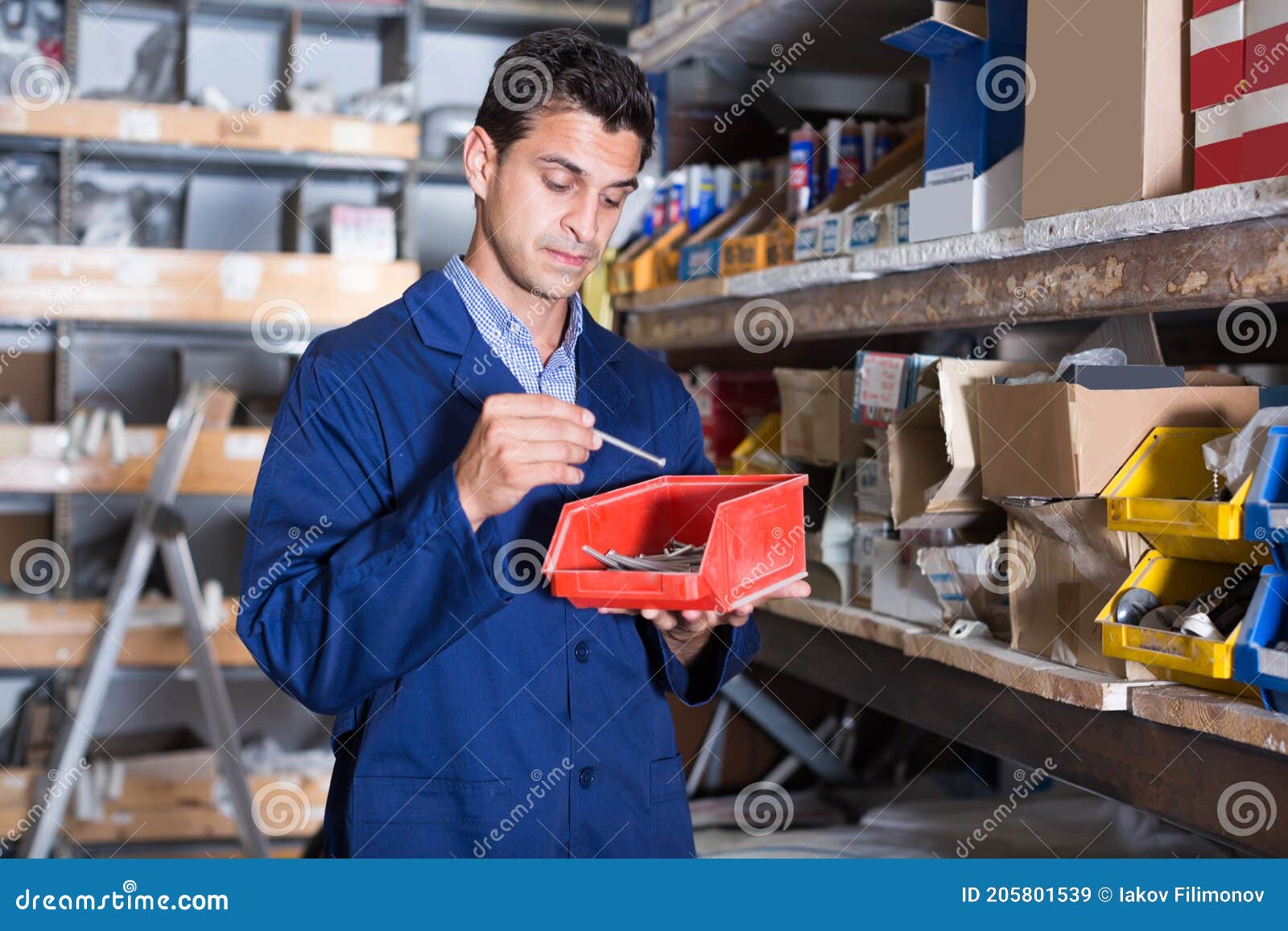 Workman is Checking Small Details in Boxes Stock Image - Image of ...