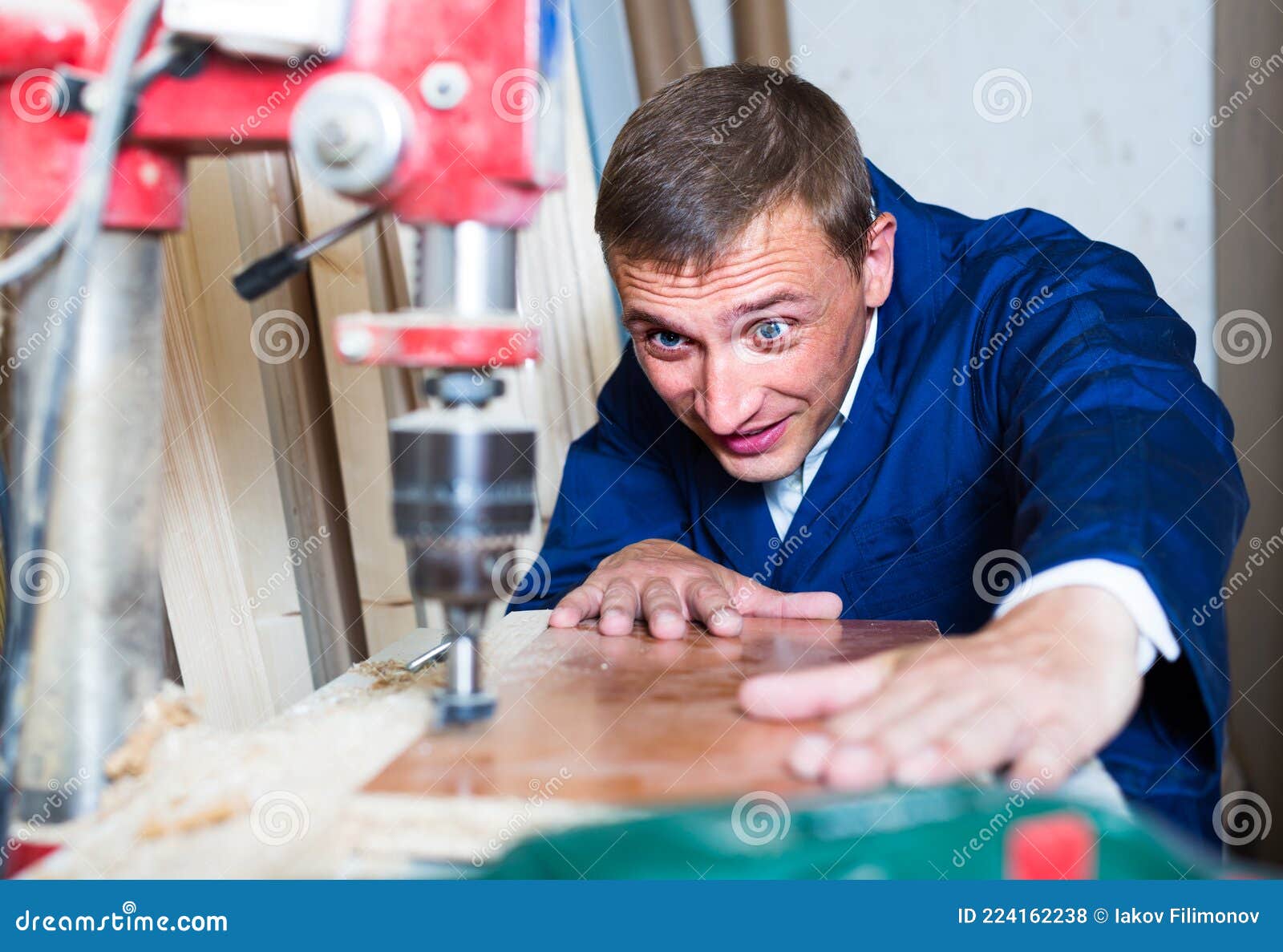 Workman drilling planks stock photo. Image of screwdriver - 224162238