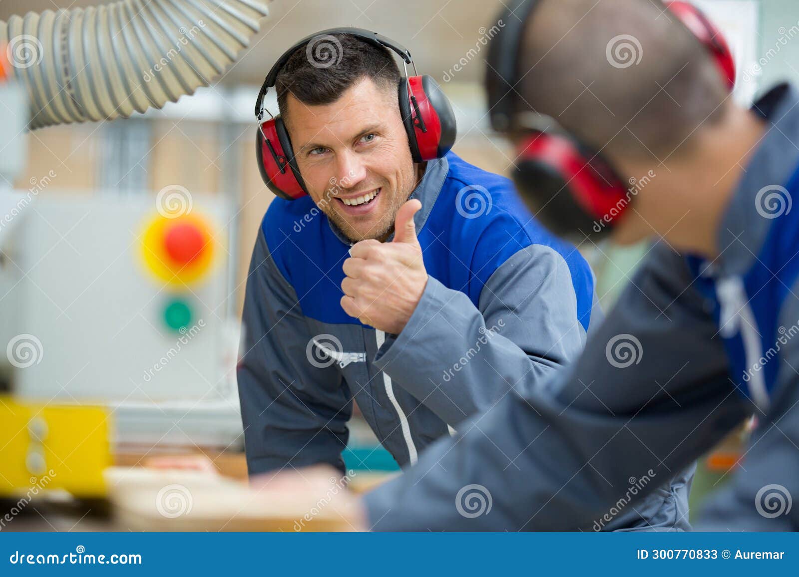 Workman in Factory Holding Thumbs Up Stock Image - Image of occupation ...