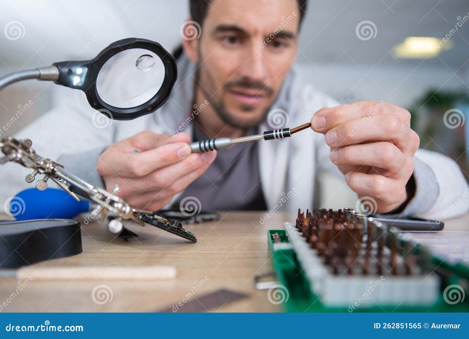 Workman Finding Correct Attachment for Tool Stock Image - Image of ...