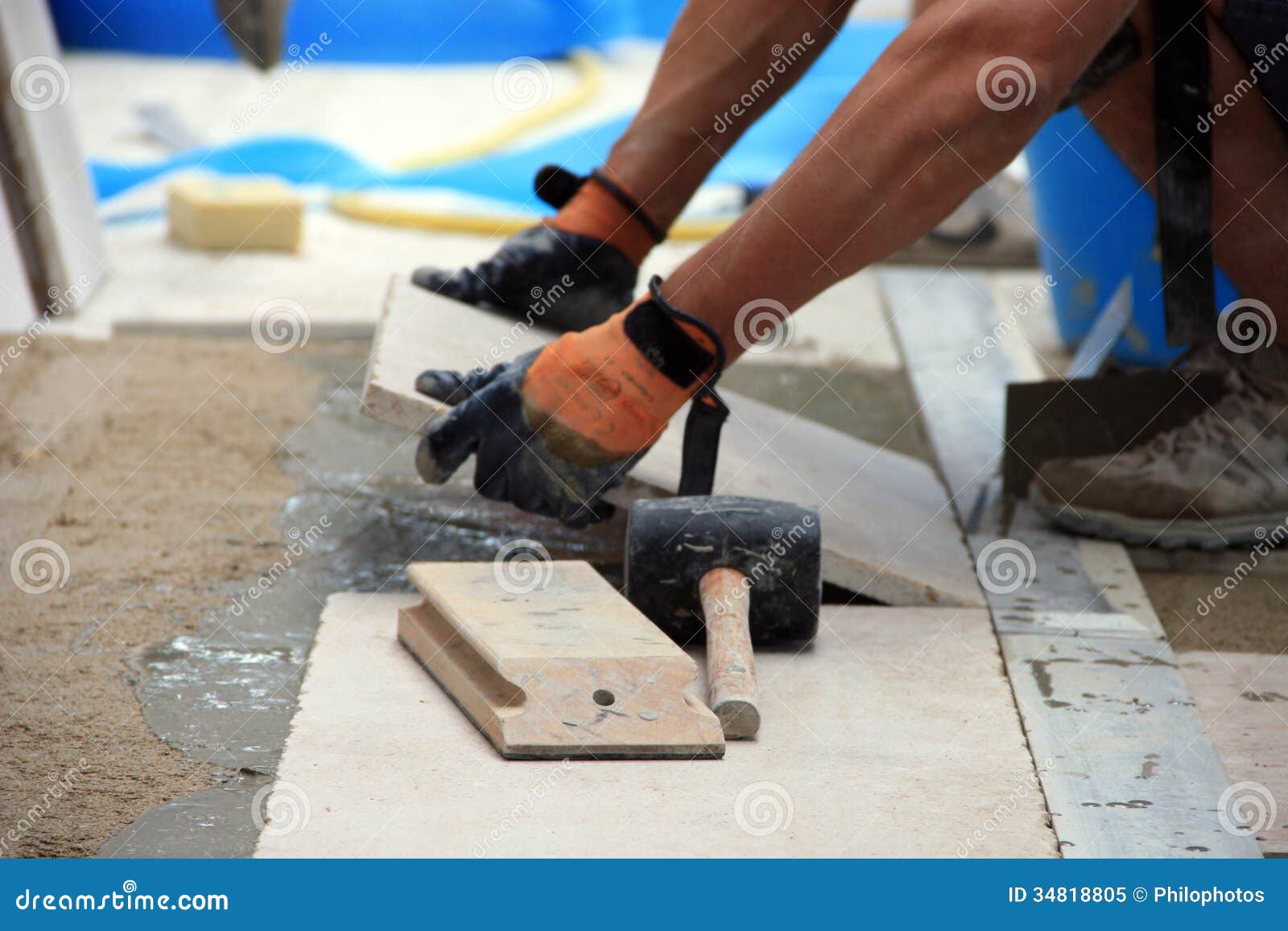 Workman on flooring stock image. Image of artisan, site - 34818805