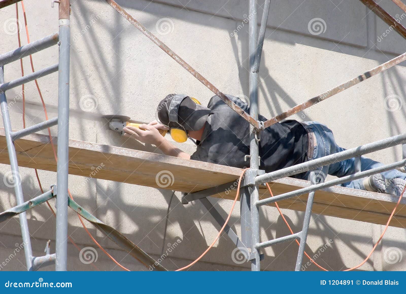 Workman Grinding Wall_7895-1S Stock Image - Image of workman, erect ...