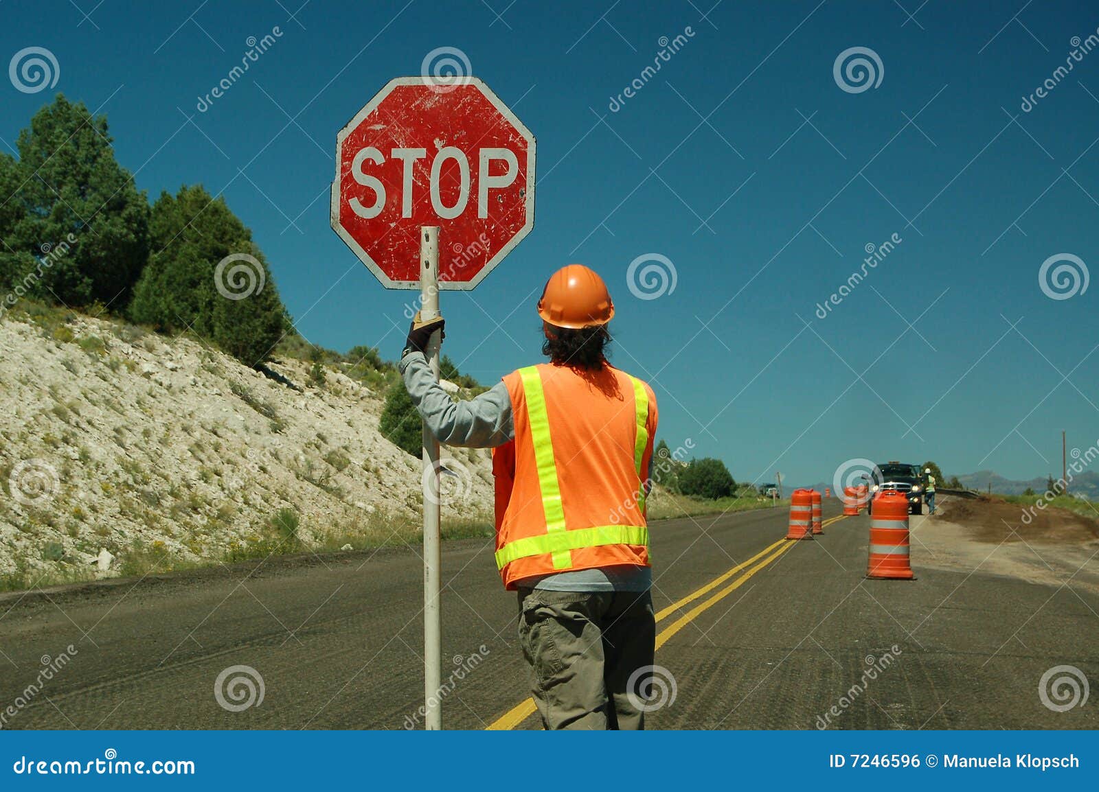 Workman Holding Stop Sign Royalty Free Stock Image - Image: 7246596