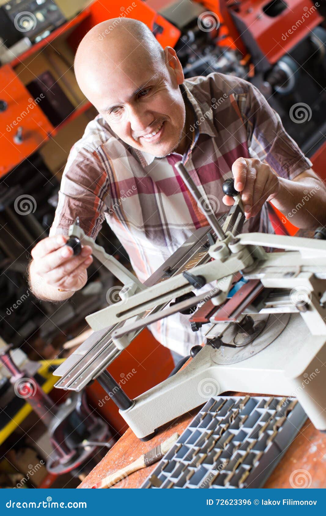 Workman Making Mailbox Plate in Workshop Stock Photo - Image of ...