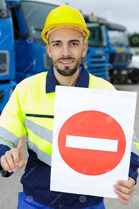 Workman making stop sign stock photo. Image of protection - 281913392