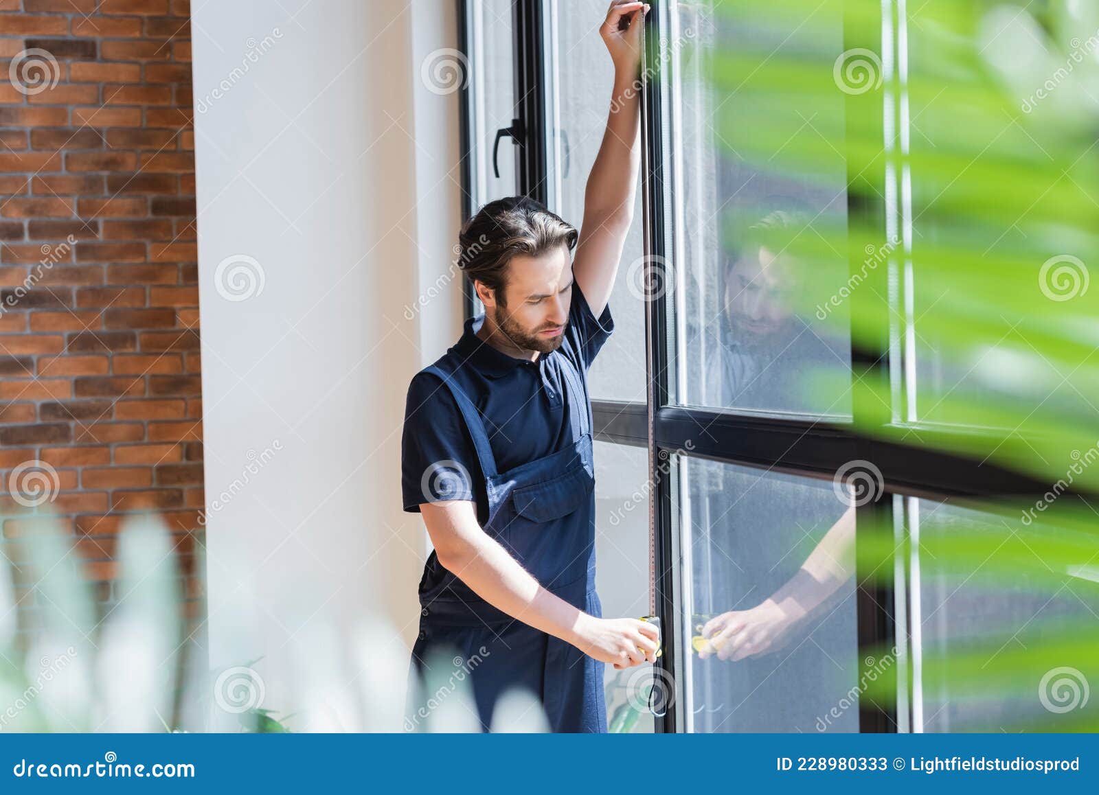 Workman Measuring Large Windows on Blurred Stock Image - Image of blur ...