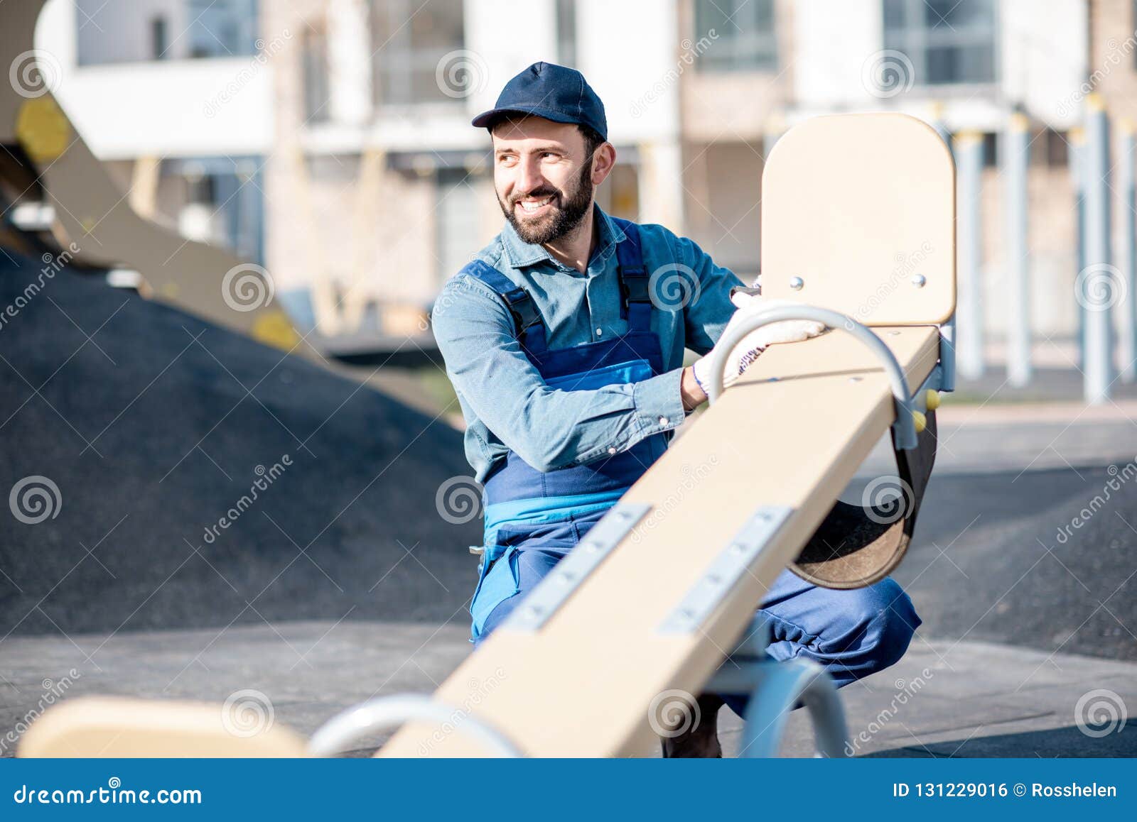 Workman Mounting Playground Stock Photo - Image of city, professional ...