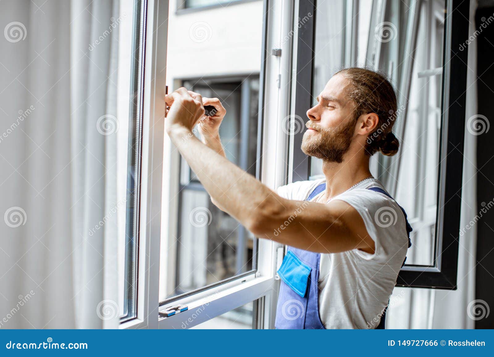 Workman Adjusting Window Frames at Home Stock Photo - Image of windows ...