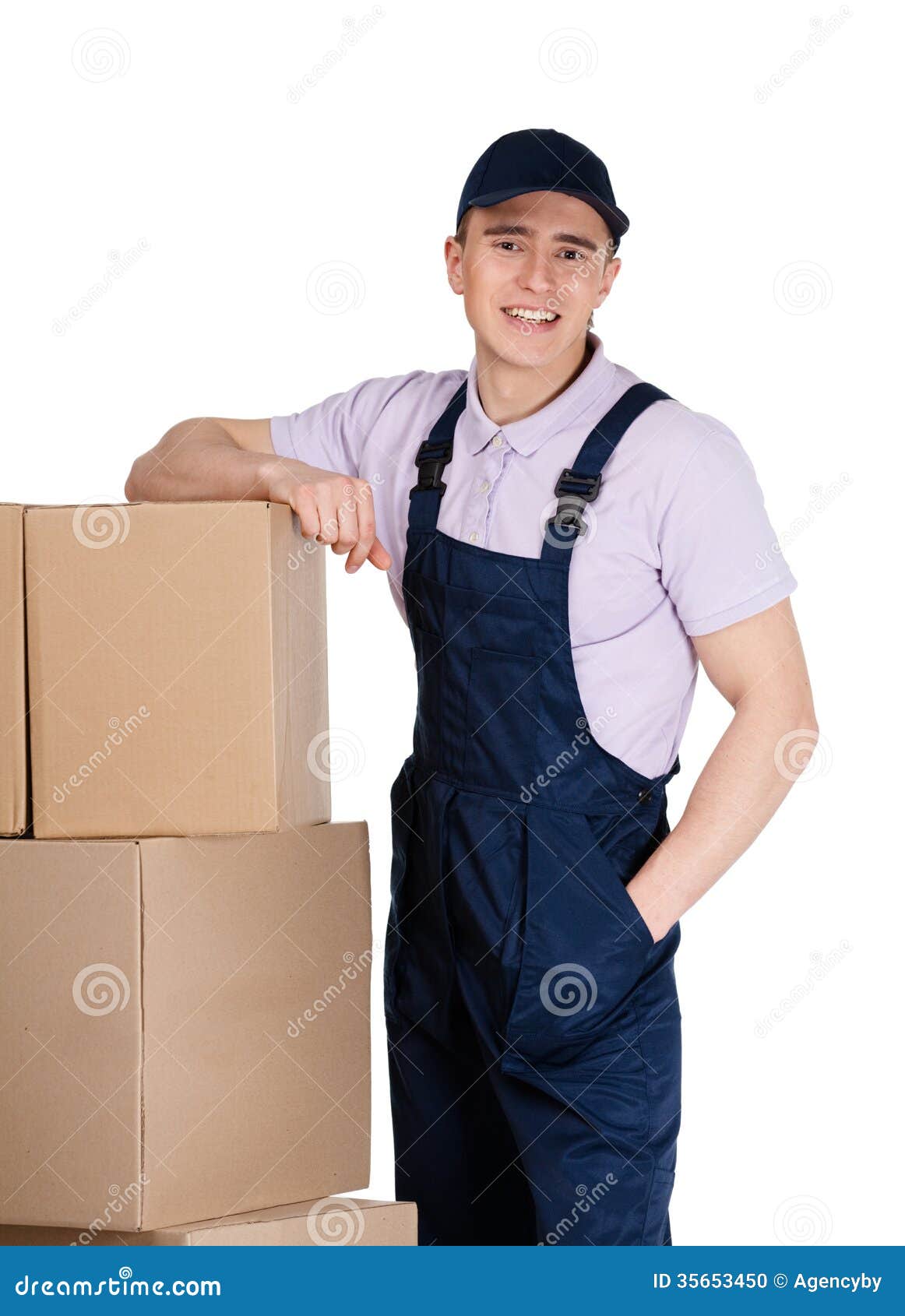 Workman in Overalls Stands Near Parcels Stock Photo - Image of length ...