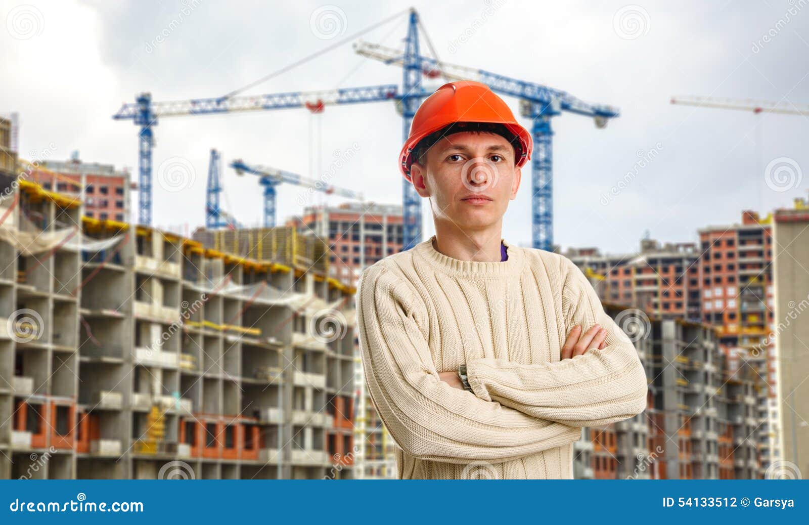 Workman in Red Helmet on Background of Buildings Stock Photo - Image of ...