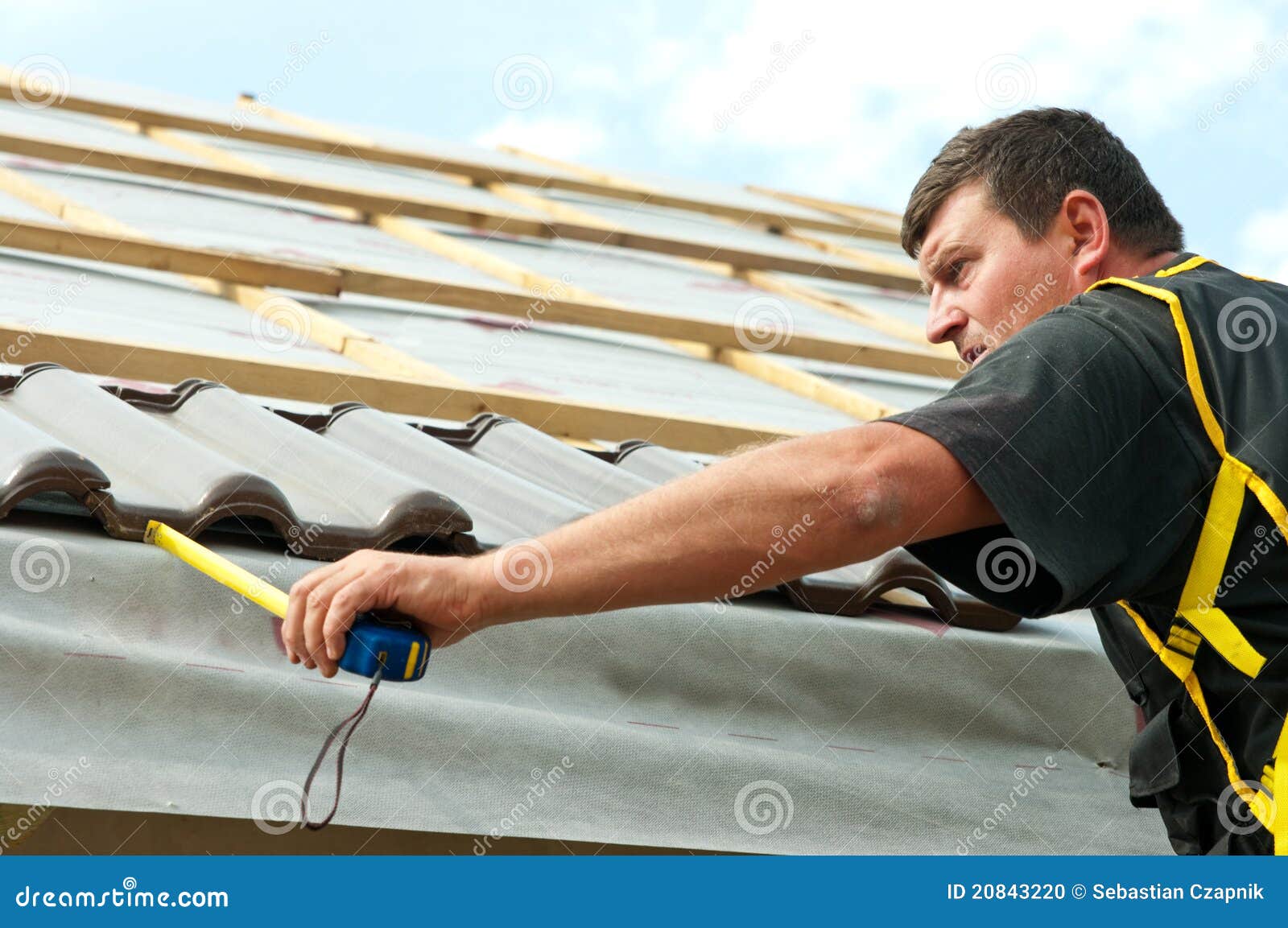 Workman tiling roof stock photo. Image of looking, architecture - 20843220