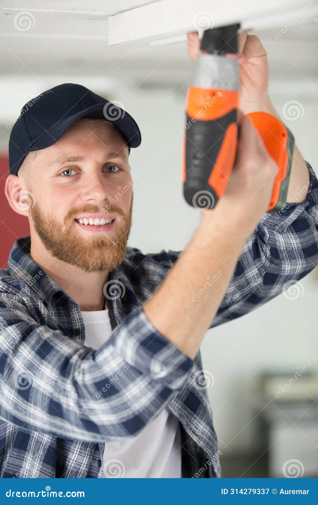 Workman Using Cordless Screwdriver on Ceiling Stock Image - Image of ...