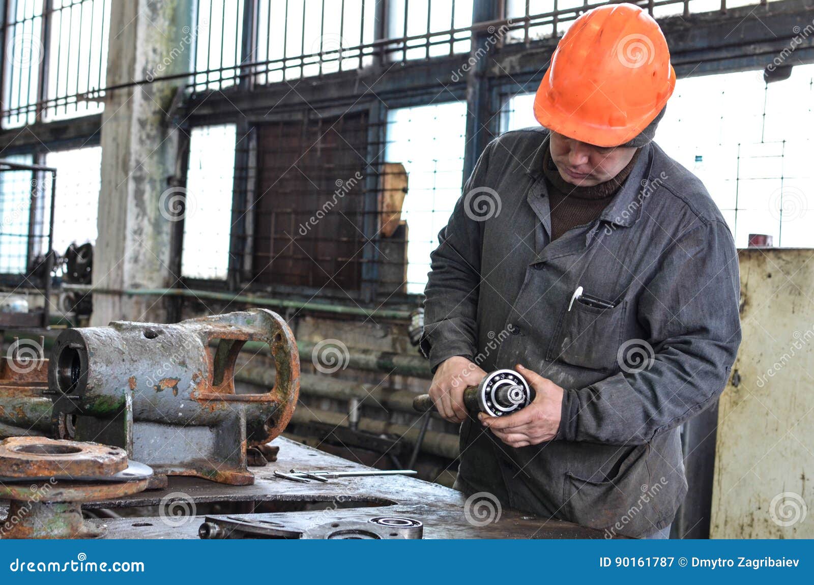 Workman Using Grinder in Workshop Editorial Photography - Image of ...