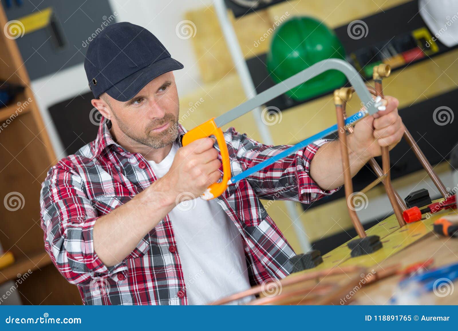 Workman Using Hacksaw on Copper Pipe Stock Image - Image of sanitation ...
