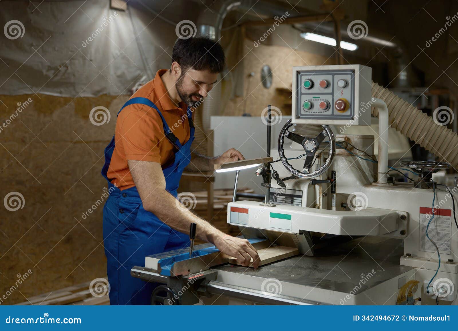 Workman Using Planer Machine for Production Wooden Materials Specific ...