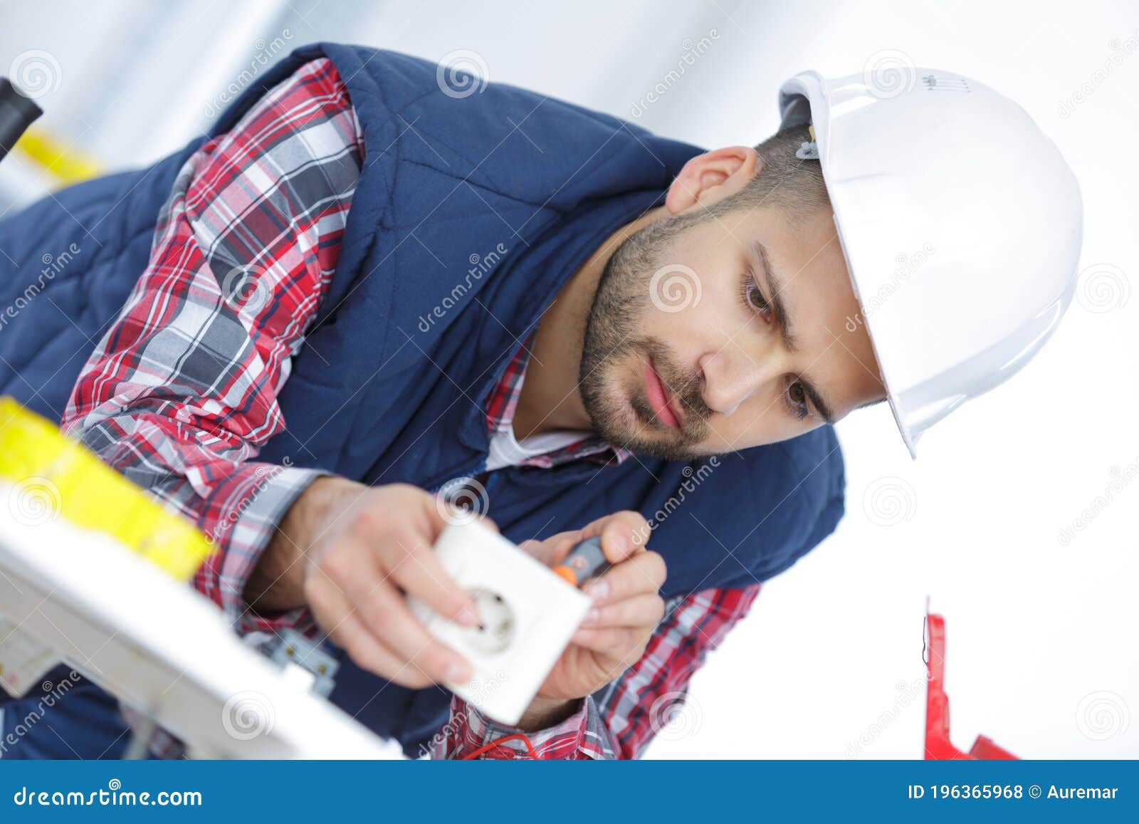 Workman Using Screwdriver on Plug Socket Stock Photo - Image of repair ...