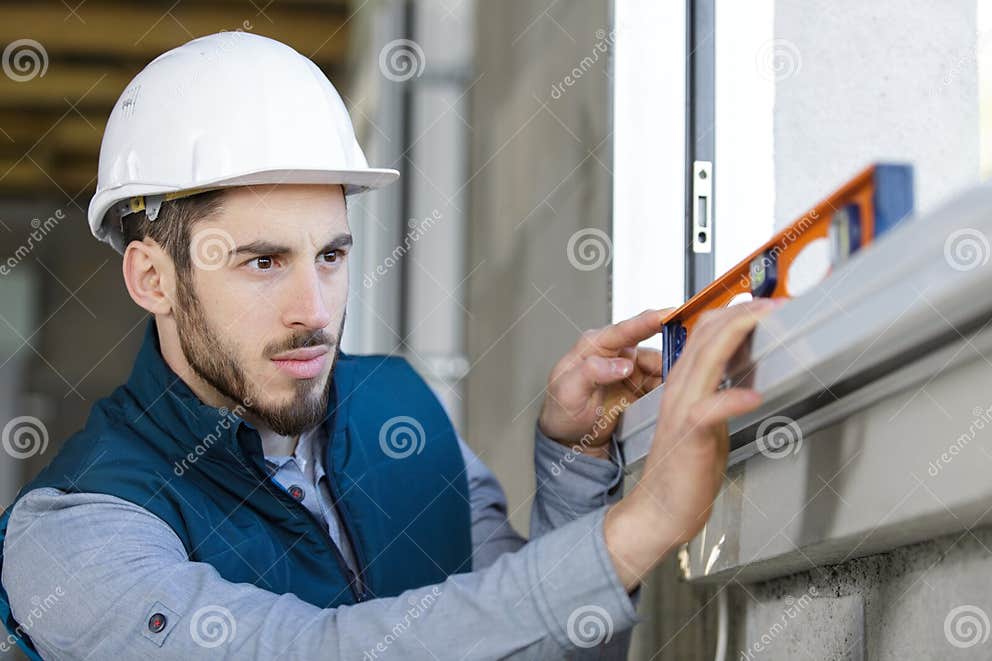 Workman Using Special Tool and Checking Level Window-frame Stock Photo - Image of renovation ...