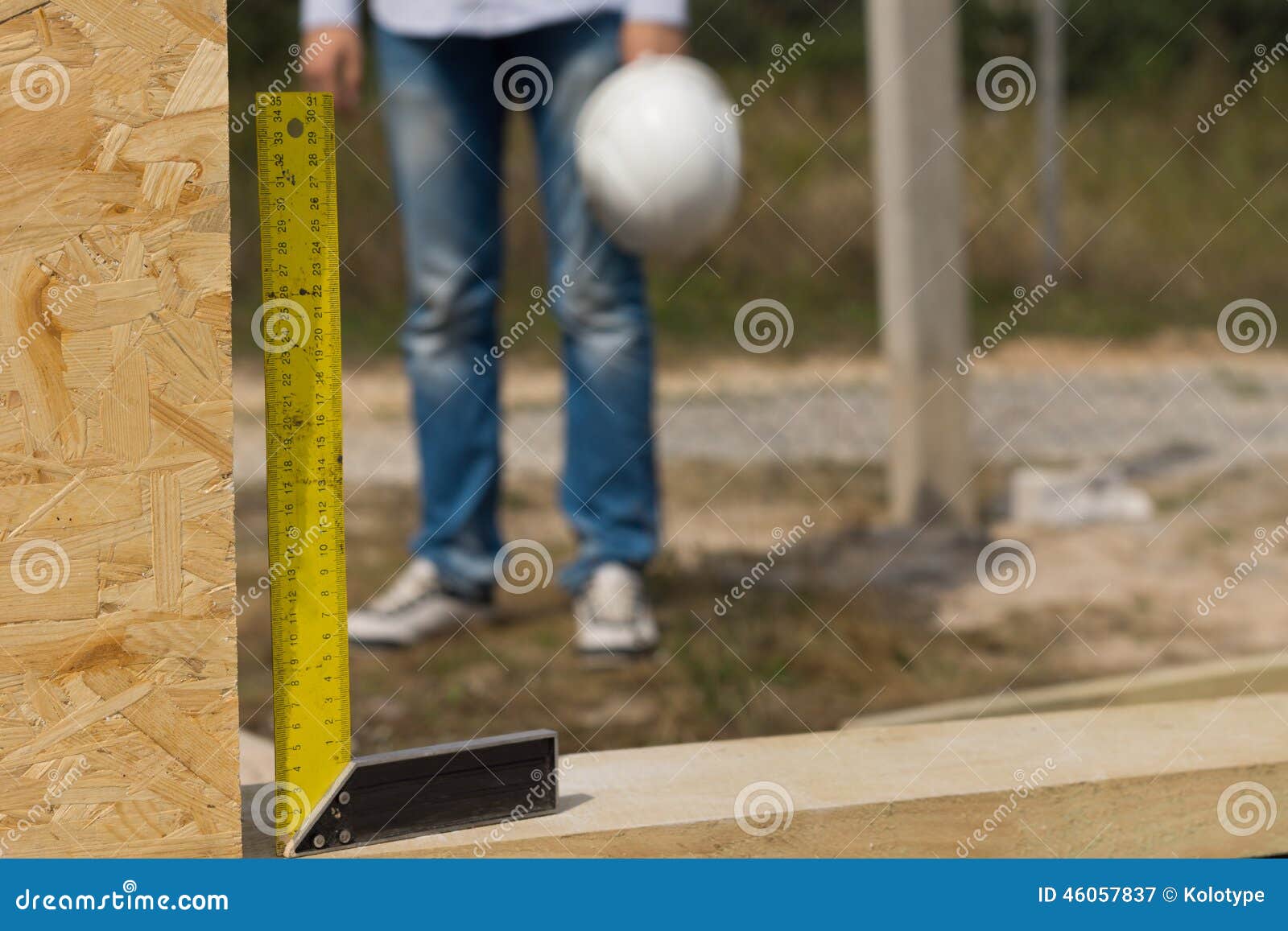 Workman using a try square stock image. Image of house - 46057837
