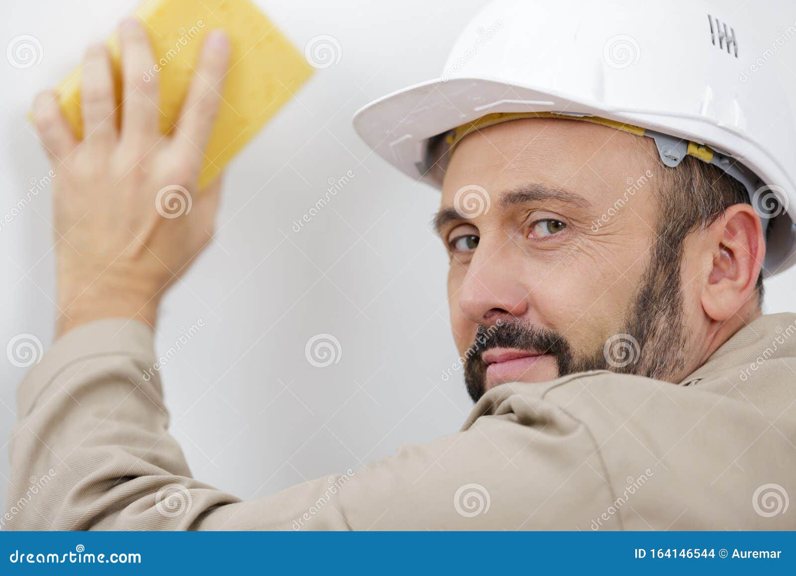 Workman washing wall stock photo. Image of service, industrial - 164146544