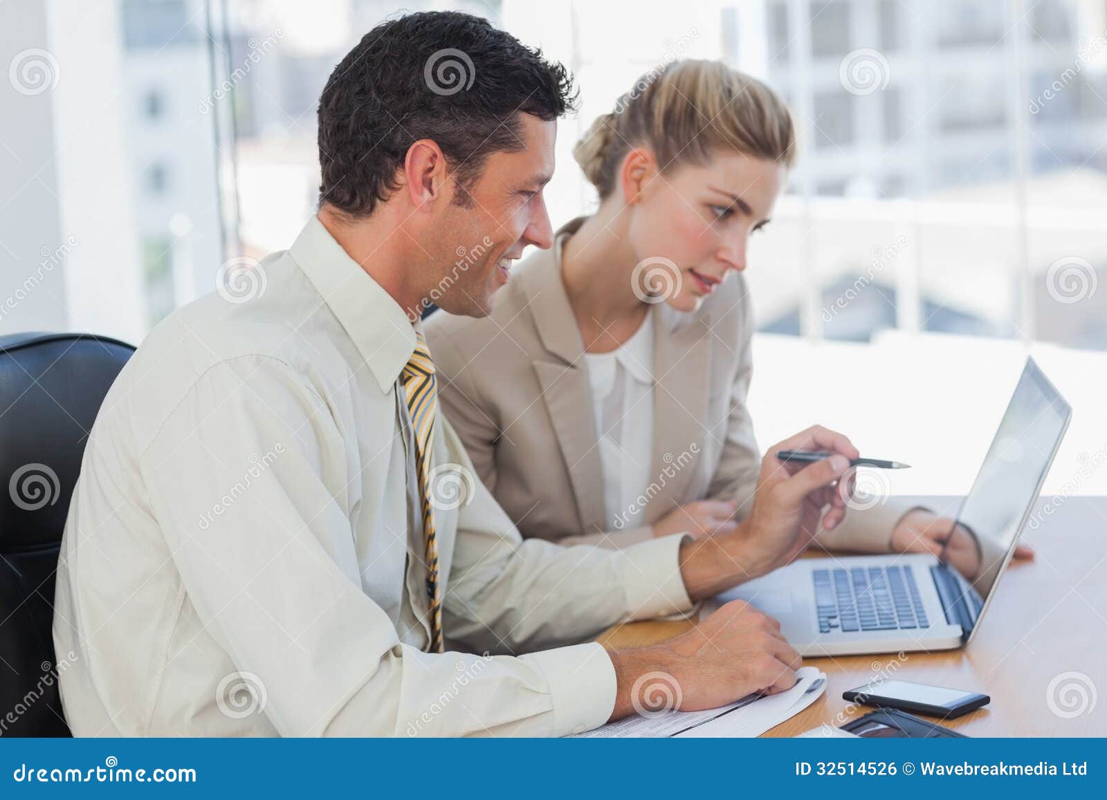Workmates Working Together on Their Computer Stock Photo - Image of ...
