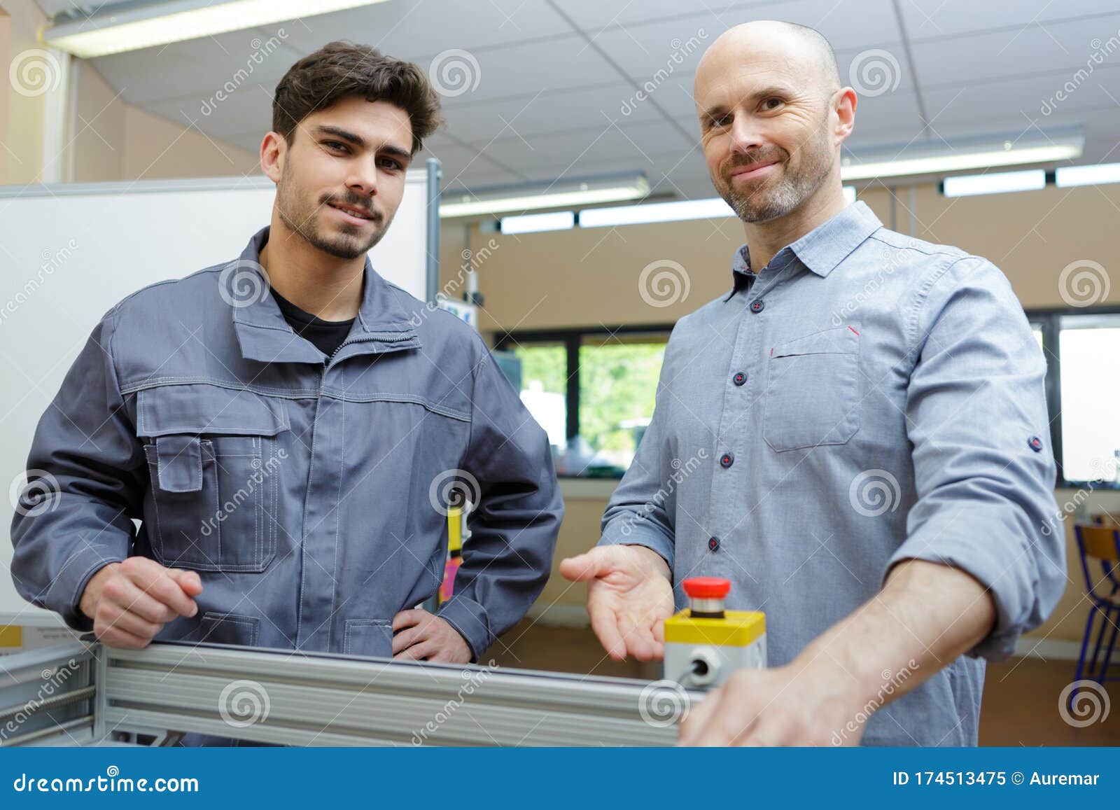 Workmen Looking at Camera in Factory Stock Image - Image of uniform ...