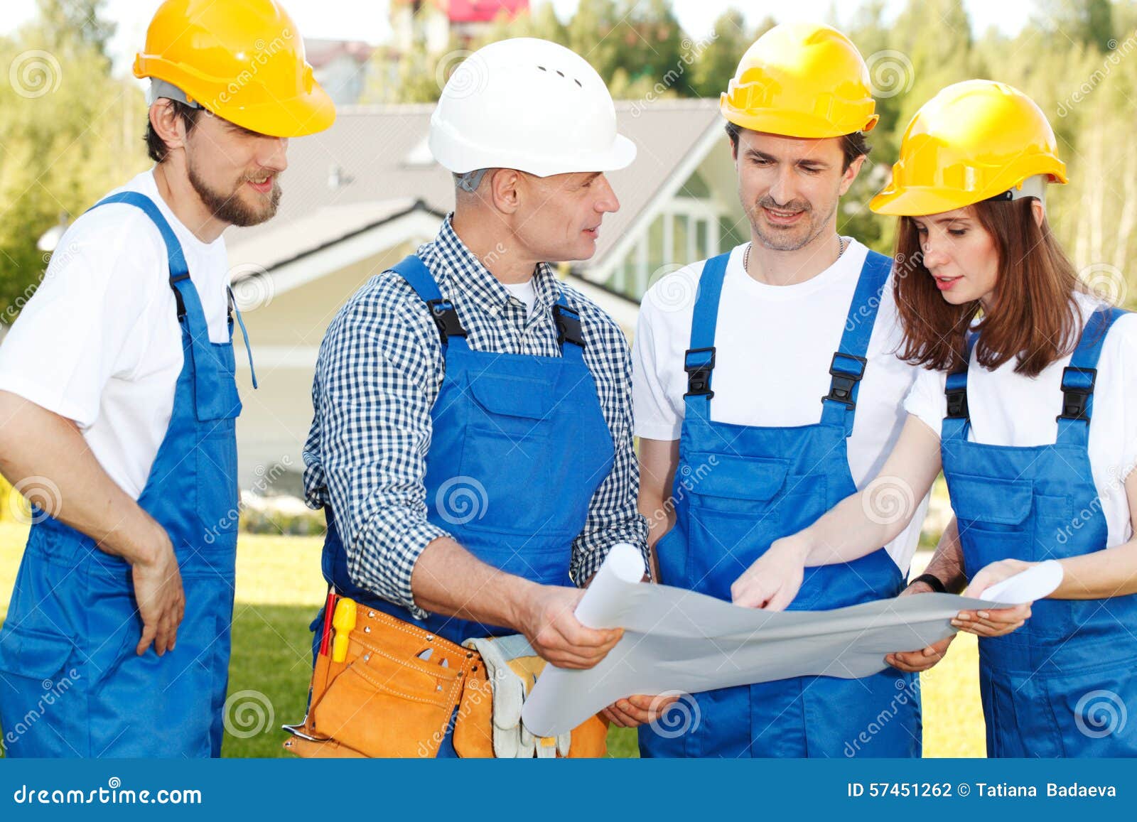 Workmen Looking at House Design Stock Photo - Image of paper, women ...