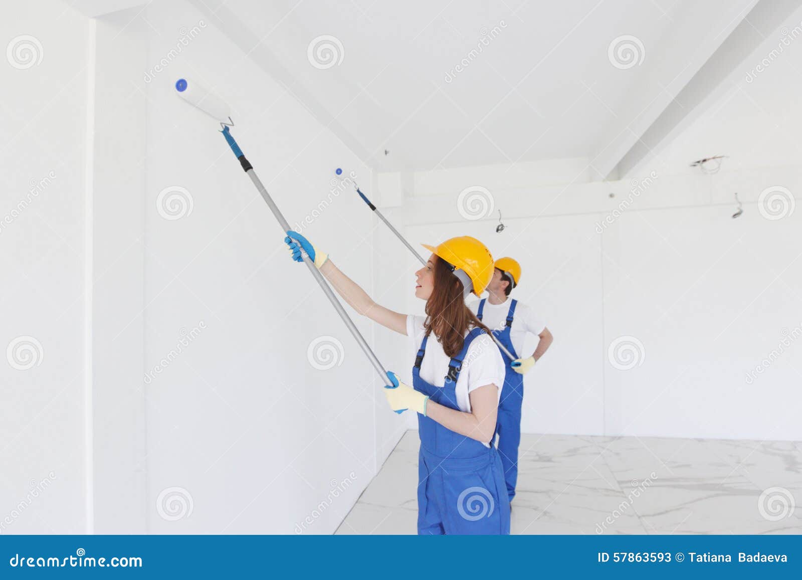 Workmen painting wall stock image. Image of smiling, construction ...