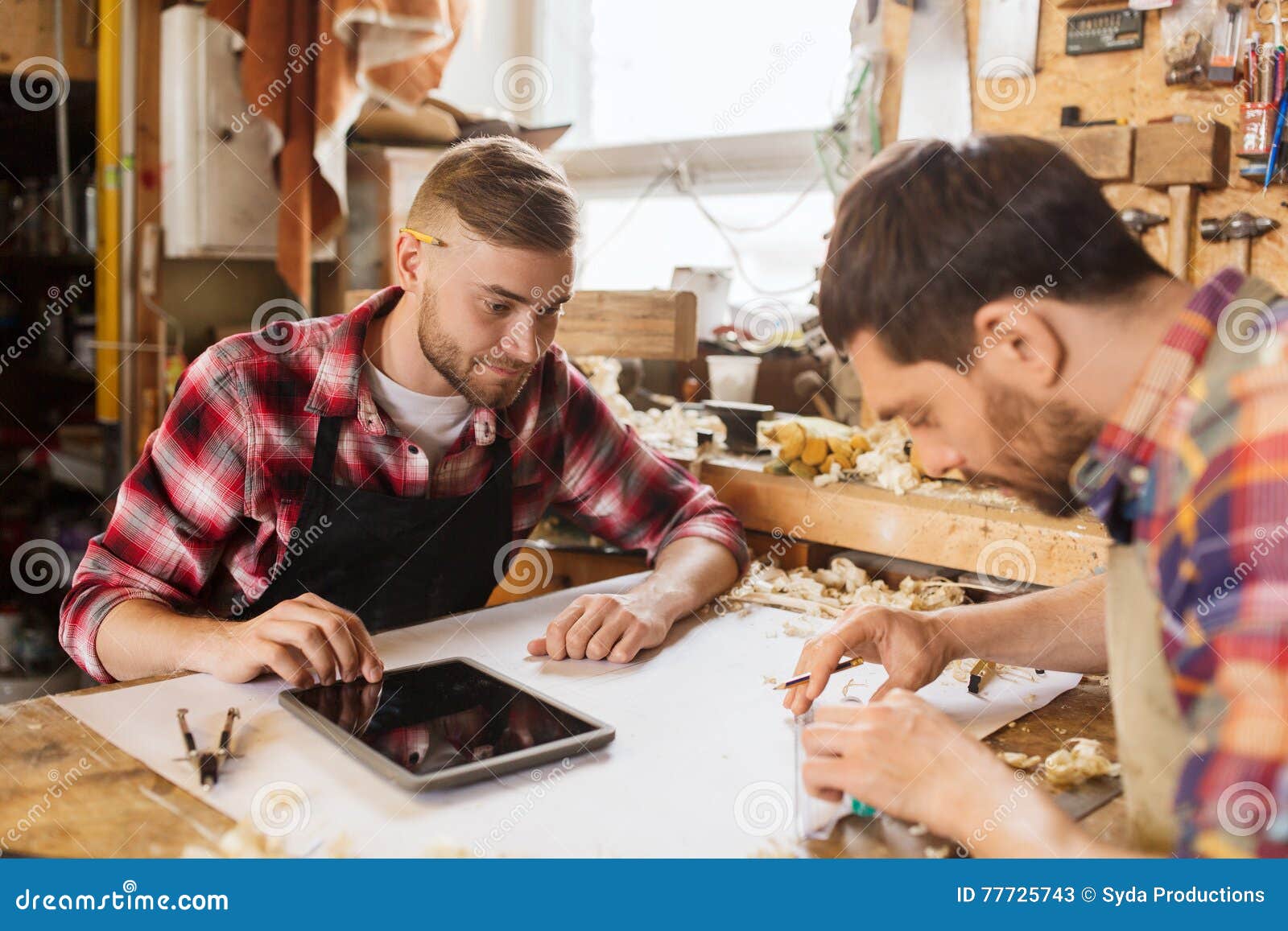Workmen with Tablet Pc and Blueprint at Workshop Stock Image - Image of ...