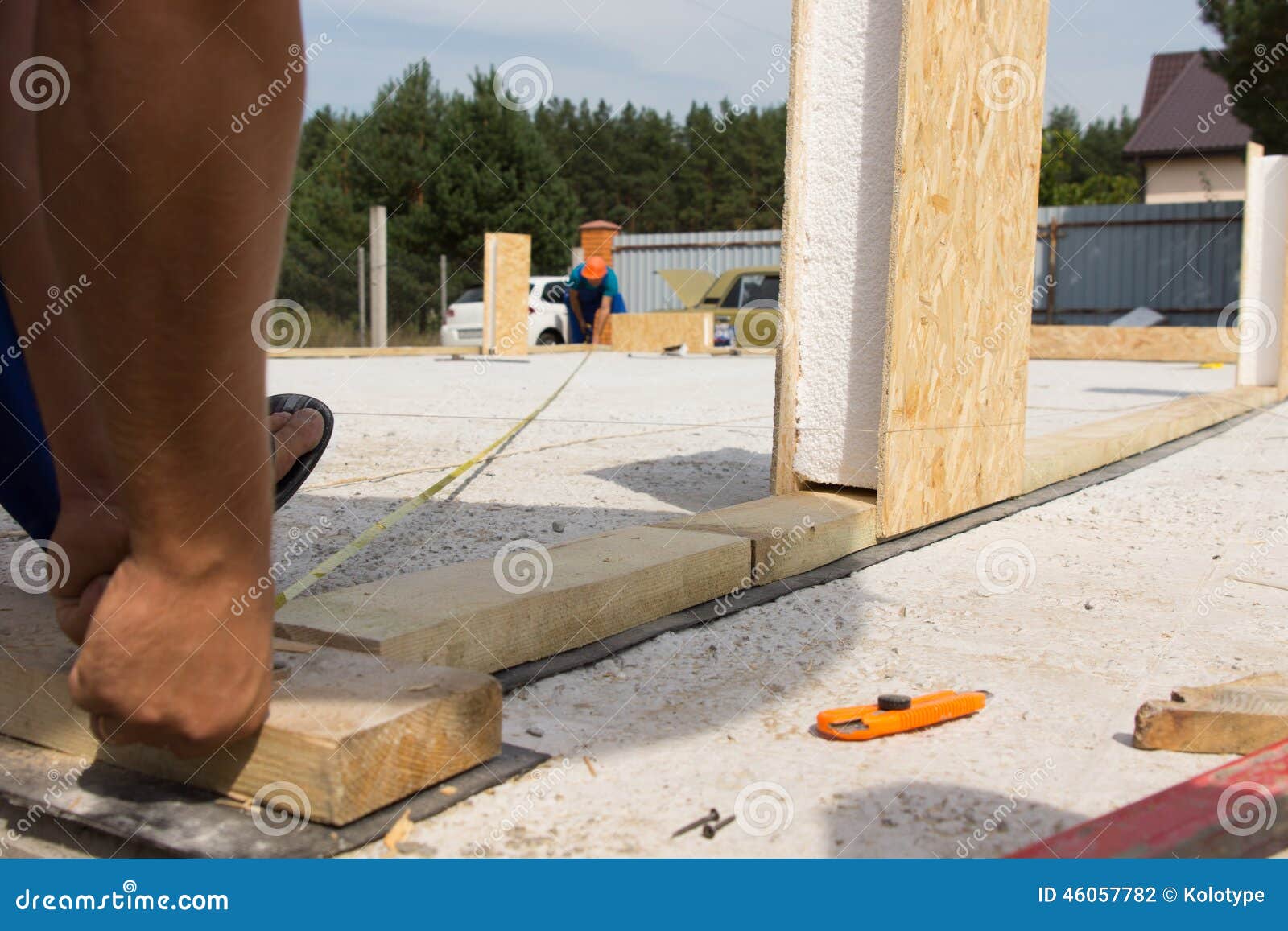Workmen Taking Measurement on a Building Site Stock Photo - Image of ...