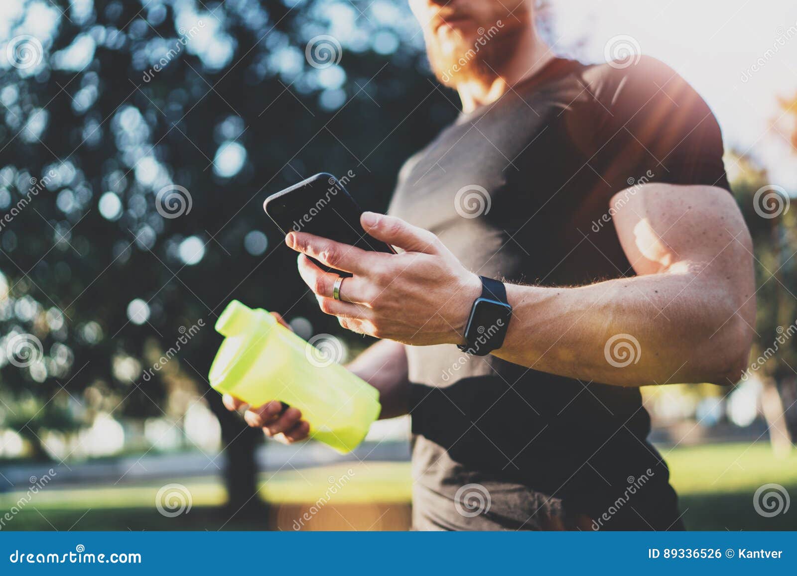 Workout Smart Fitness Concept.Young Muscular Athlete Checking Training ...