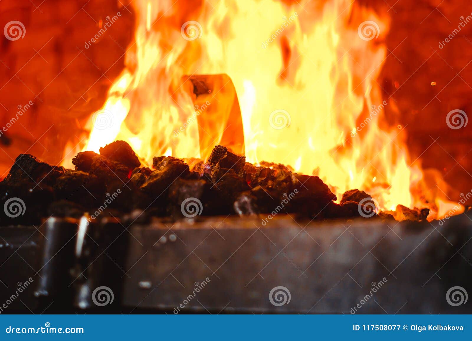 Fire On A Blacksmith. Blacksmith At Work. Dark Background. Splinters Of ...
