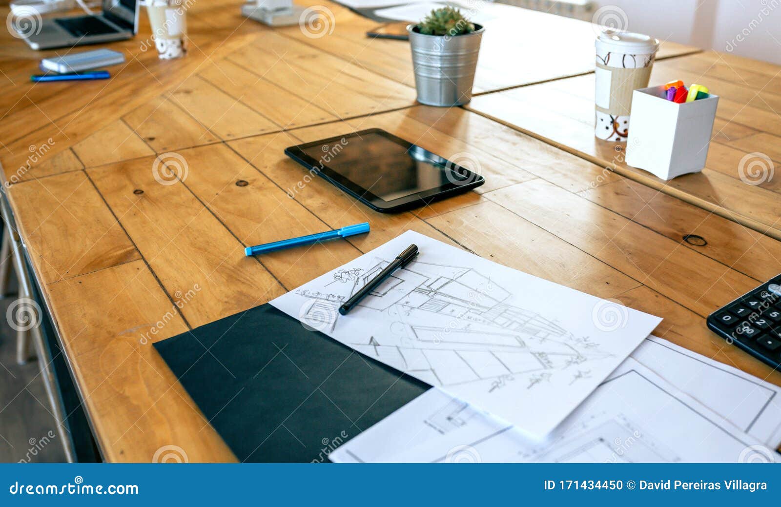 Workplace of an Architect with Blueprints and Sketches Stock Photo ...