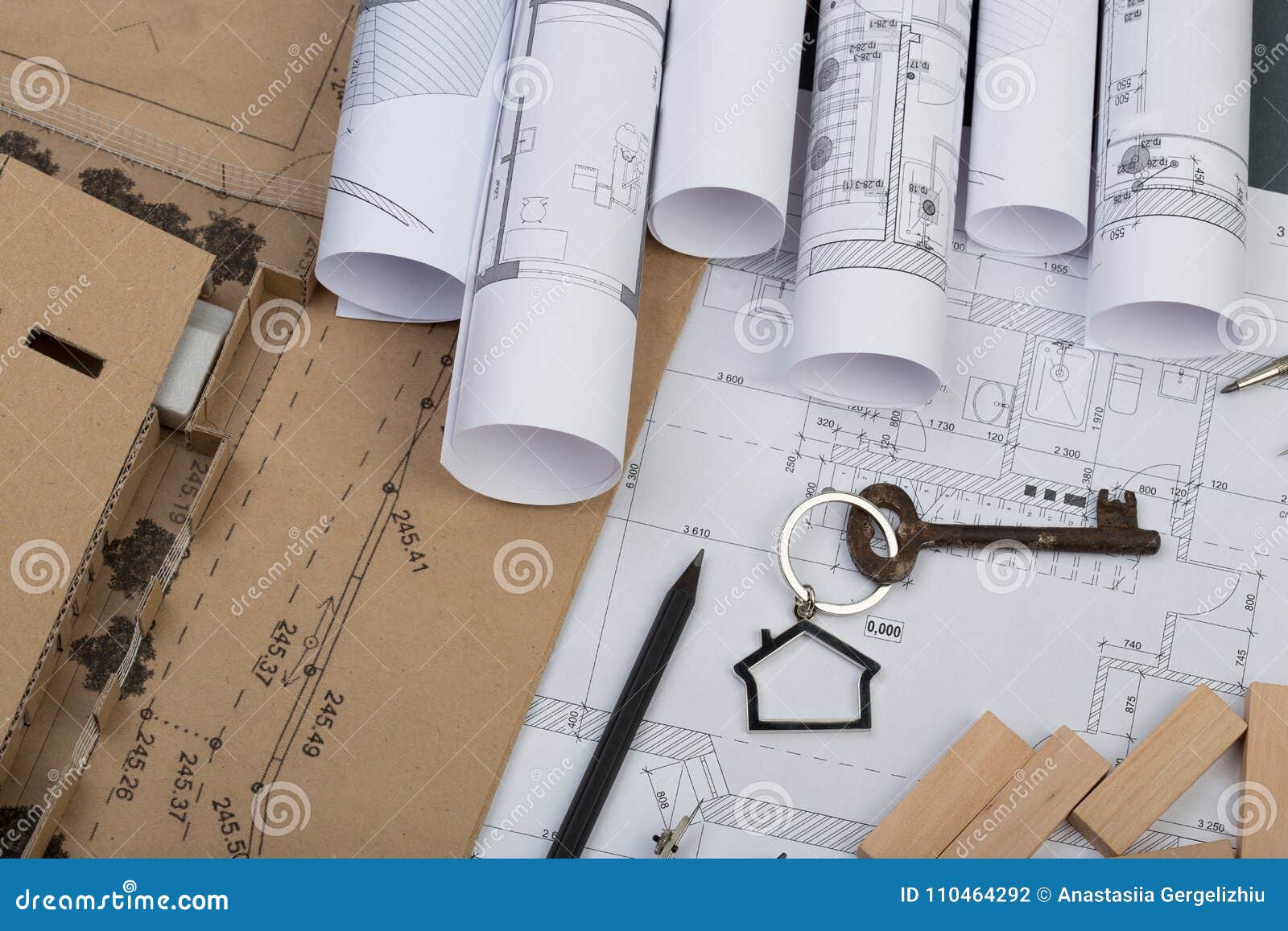 Workplace of Architect - Key with Trinket in the Shape of a House ...