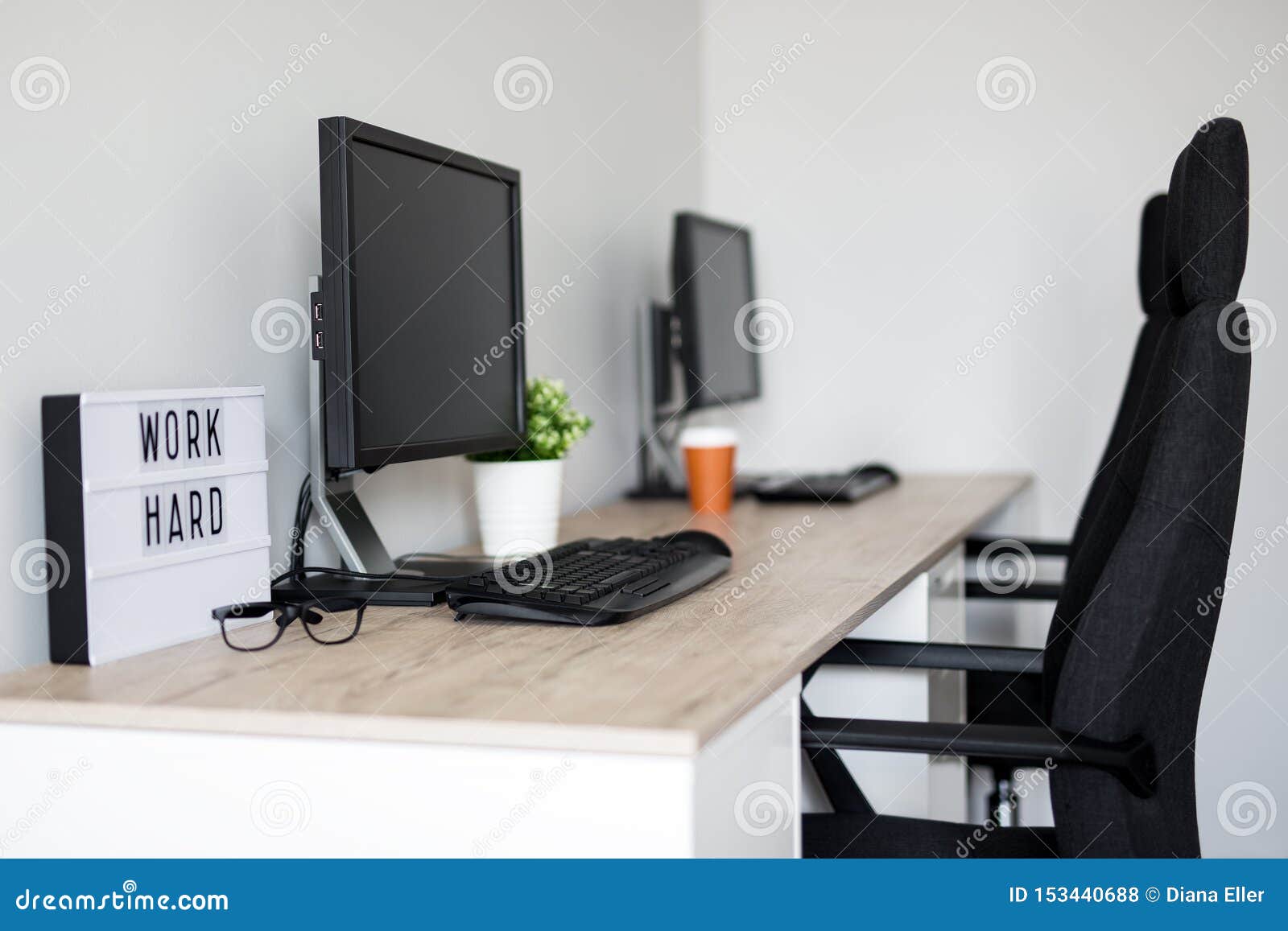 Workplace with Blank Screen Computers in Bright Office Stock Photo ...