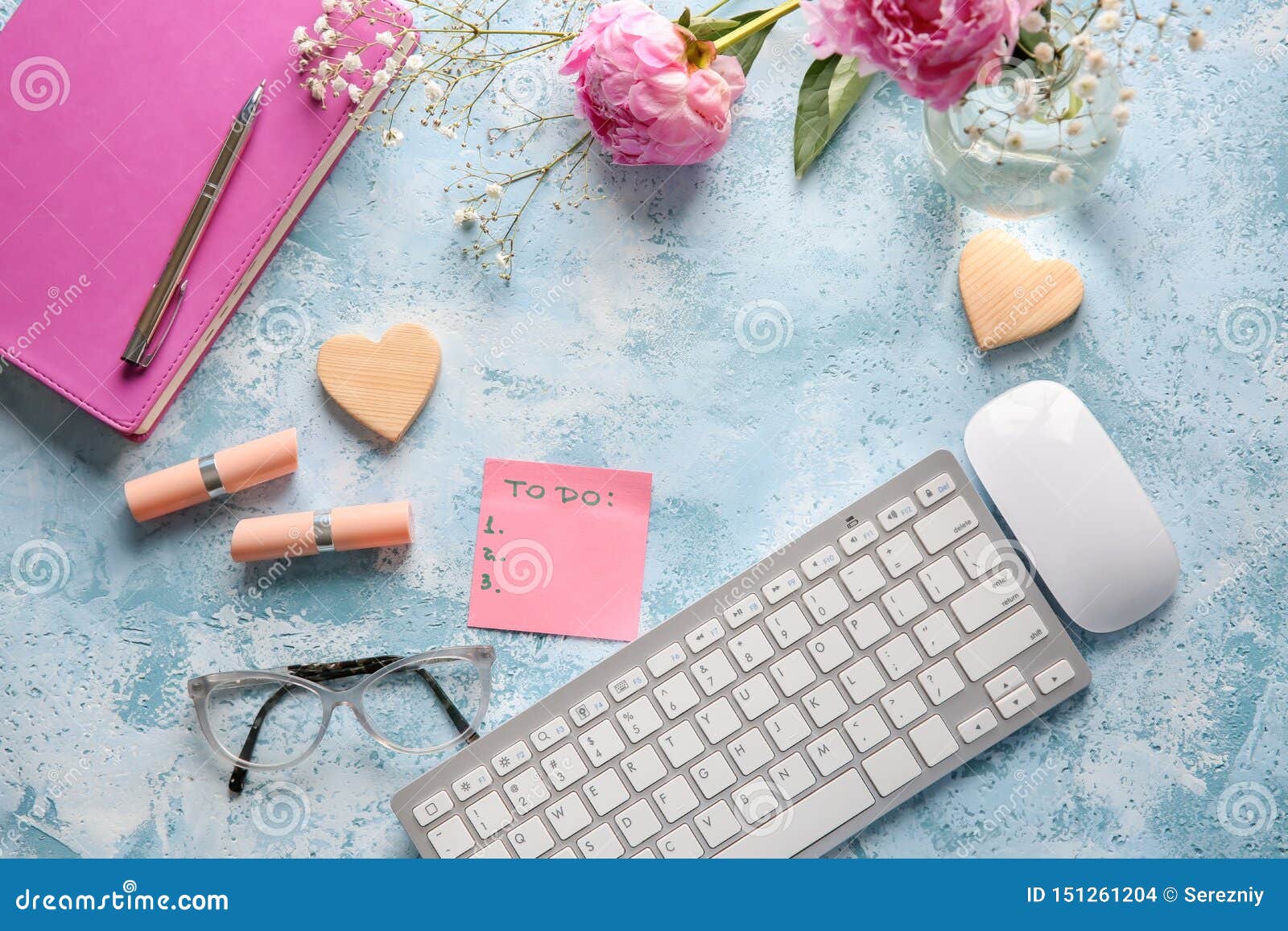 Workplace with Computer Keyboard and Beautiful Flowers on Color Table ...