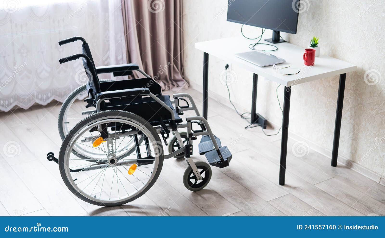 Workplace for a Disabled Person. Wheelchair at the Table with a ...