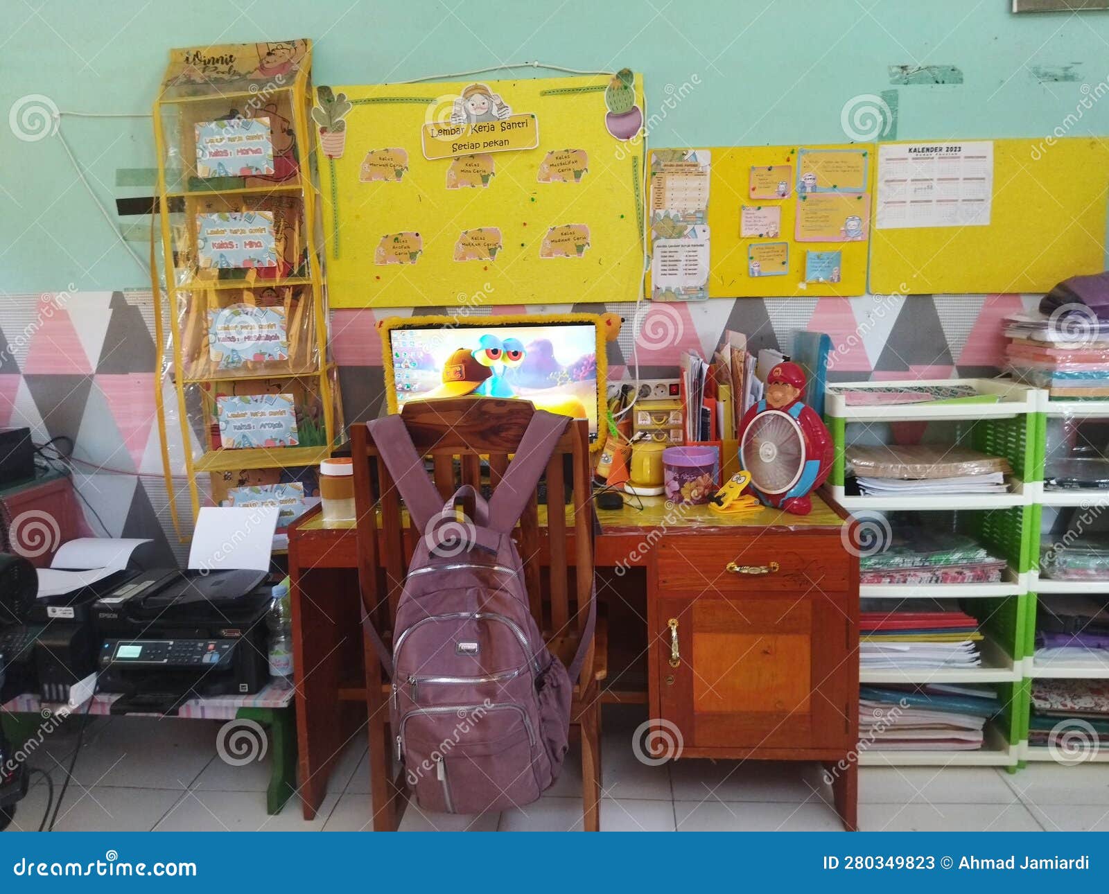 The Workplace is Dominated by Yellow. Graphic Design Workspace. Messy ...