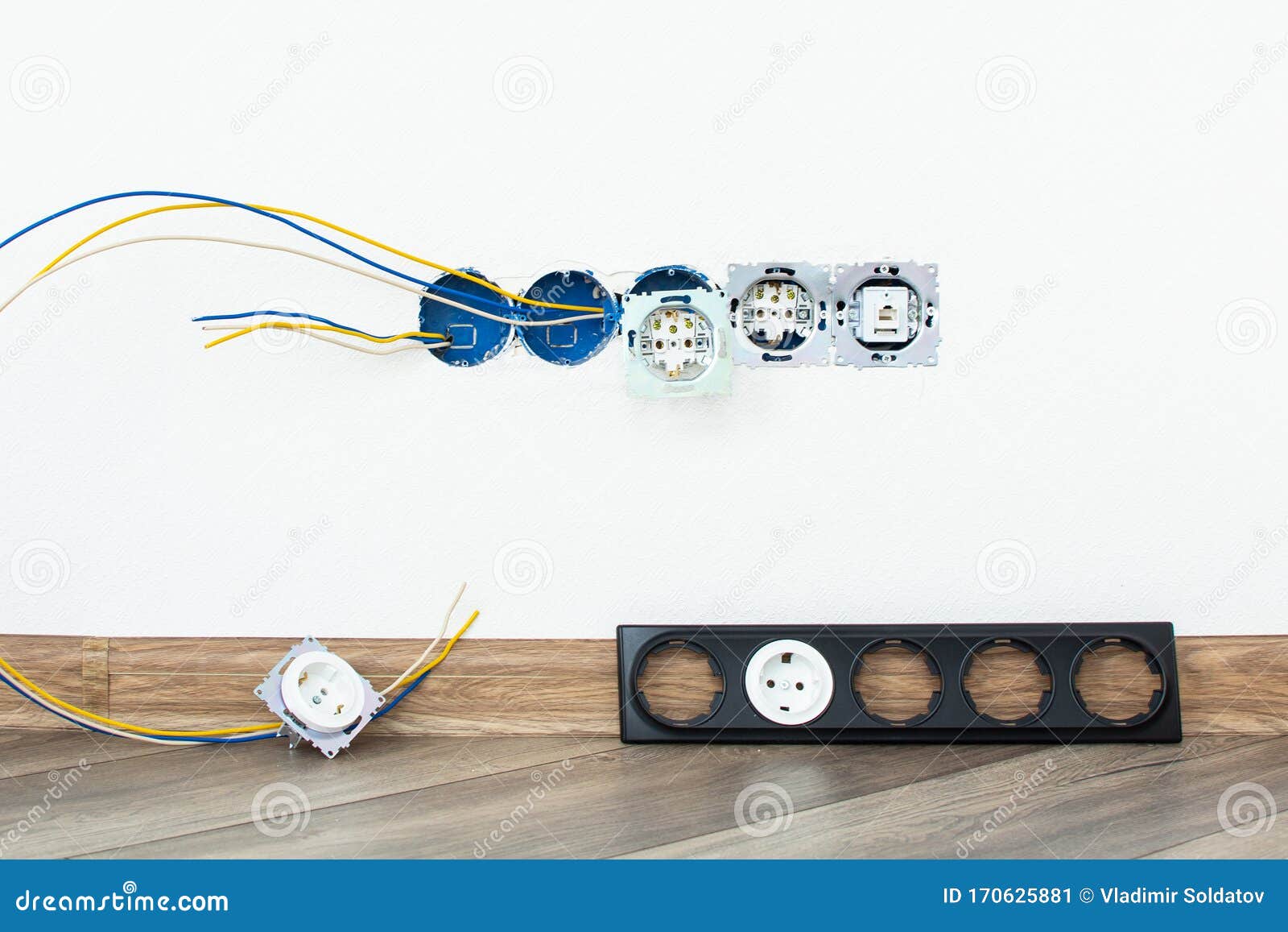 Workplace Electrician. The Process Of Installing Sockets In The ...