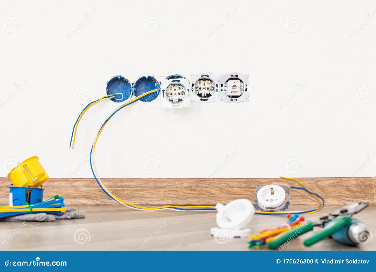 Workplace Electrician. the Process of Installing Sockets in the ...