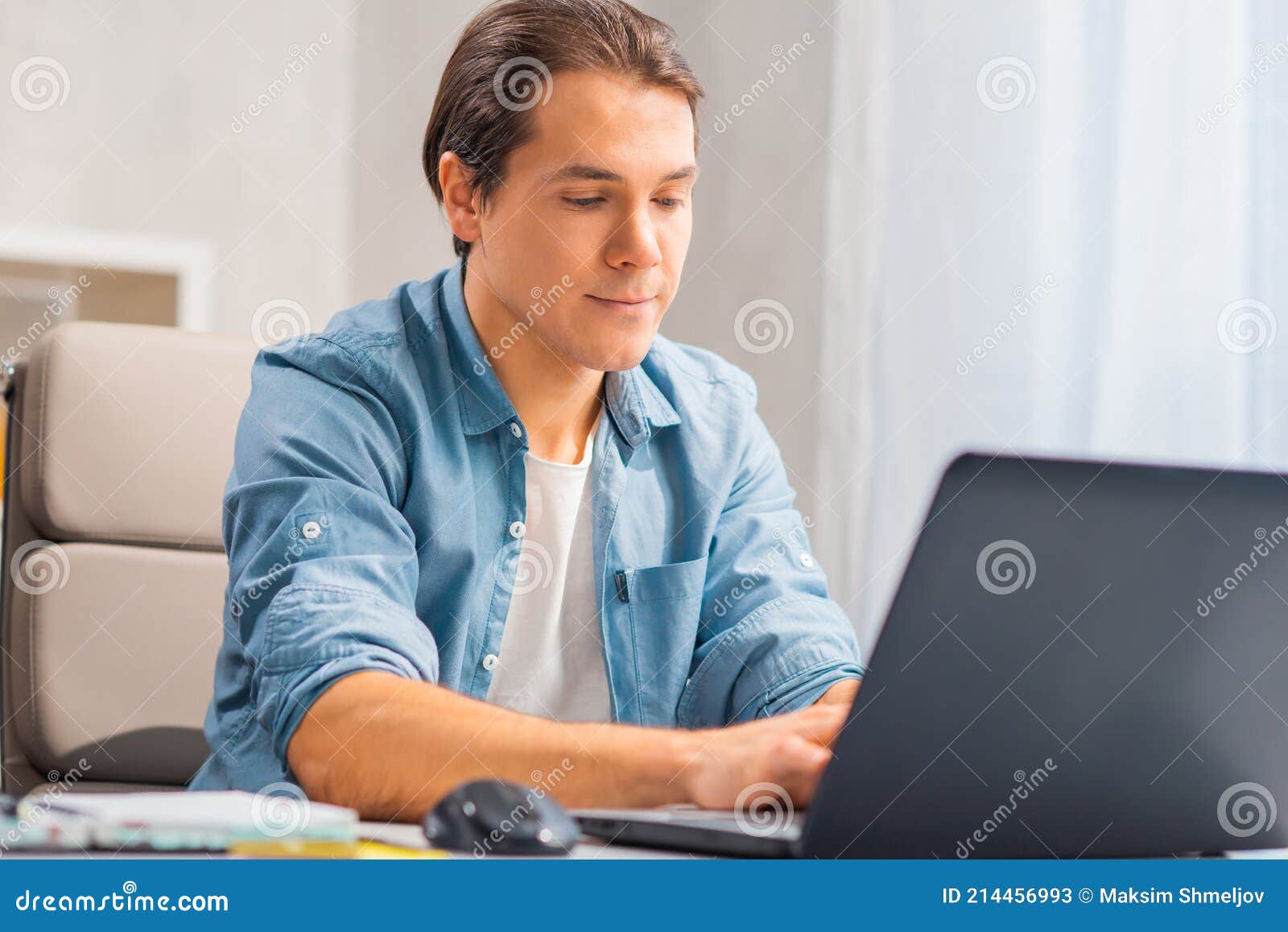 Workplace of Freelance Worker at Home Office. Young Man Works Using ...