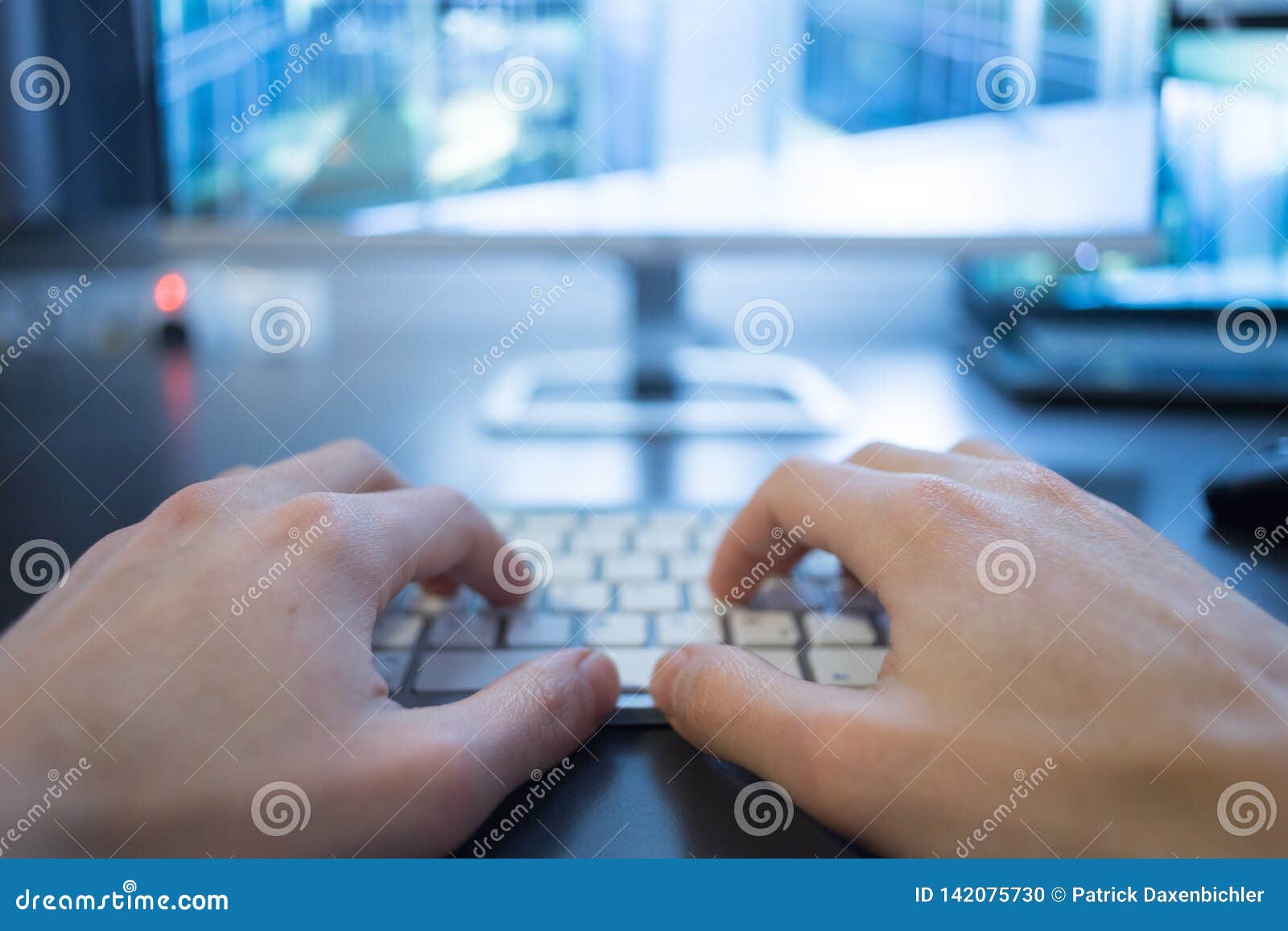 Workplace of a Freelancer: Typing Hands, Screen in the Blurry ...