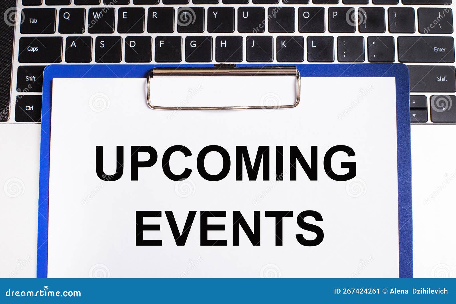 A Workplace with a Keyboard and a Tablet for Papers with UPCOMING ...