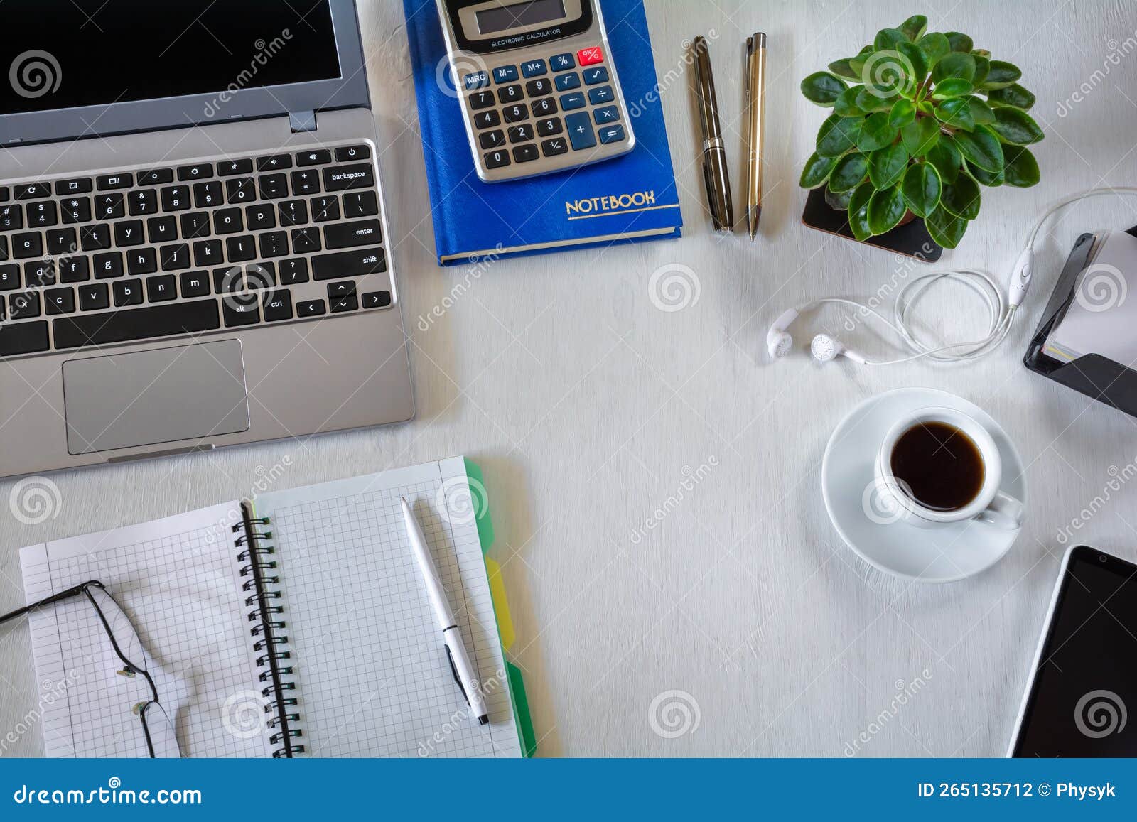 Workplace. a Laptop, a Calculator, Notebooks and a Cup of Coffee on a ...
