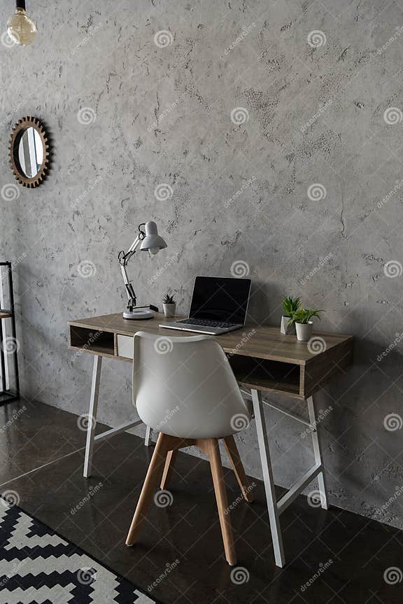 Workplace with Laptop Computer and Flower Pots Stock Photo - Image of ...