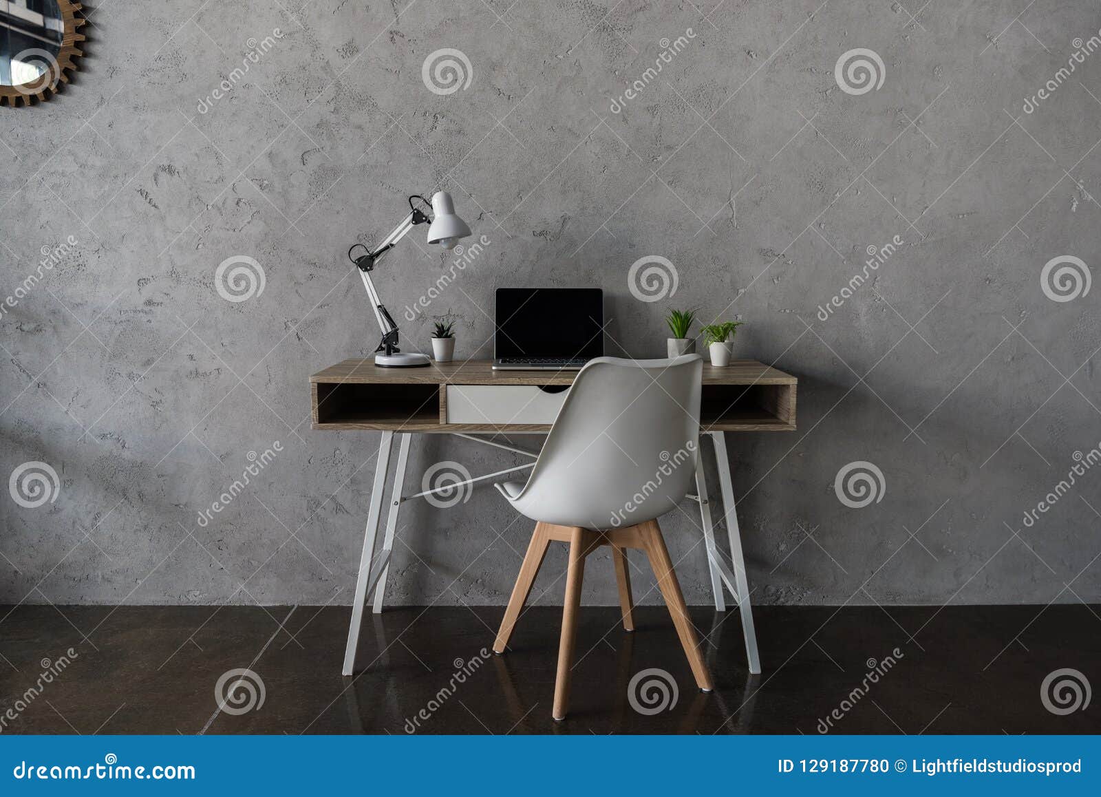 Workplace with Laptop Computer and Little Flower Pots Stock Photo ...