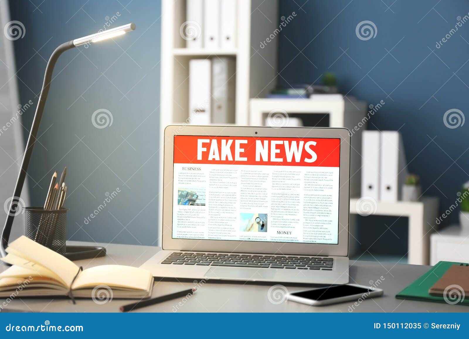 Workplace with Laptop and Fake News on Screen Stock Image - Image of ...