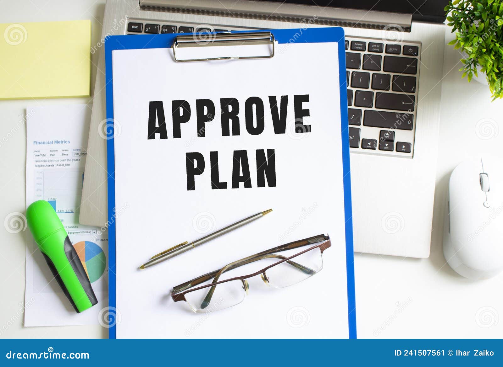 Workplace with Laptop, Folder and Graph on the Table. the Folder with ...