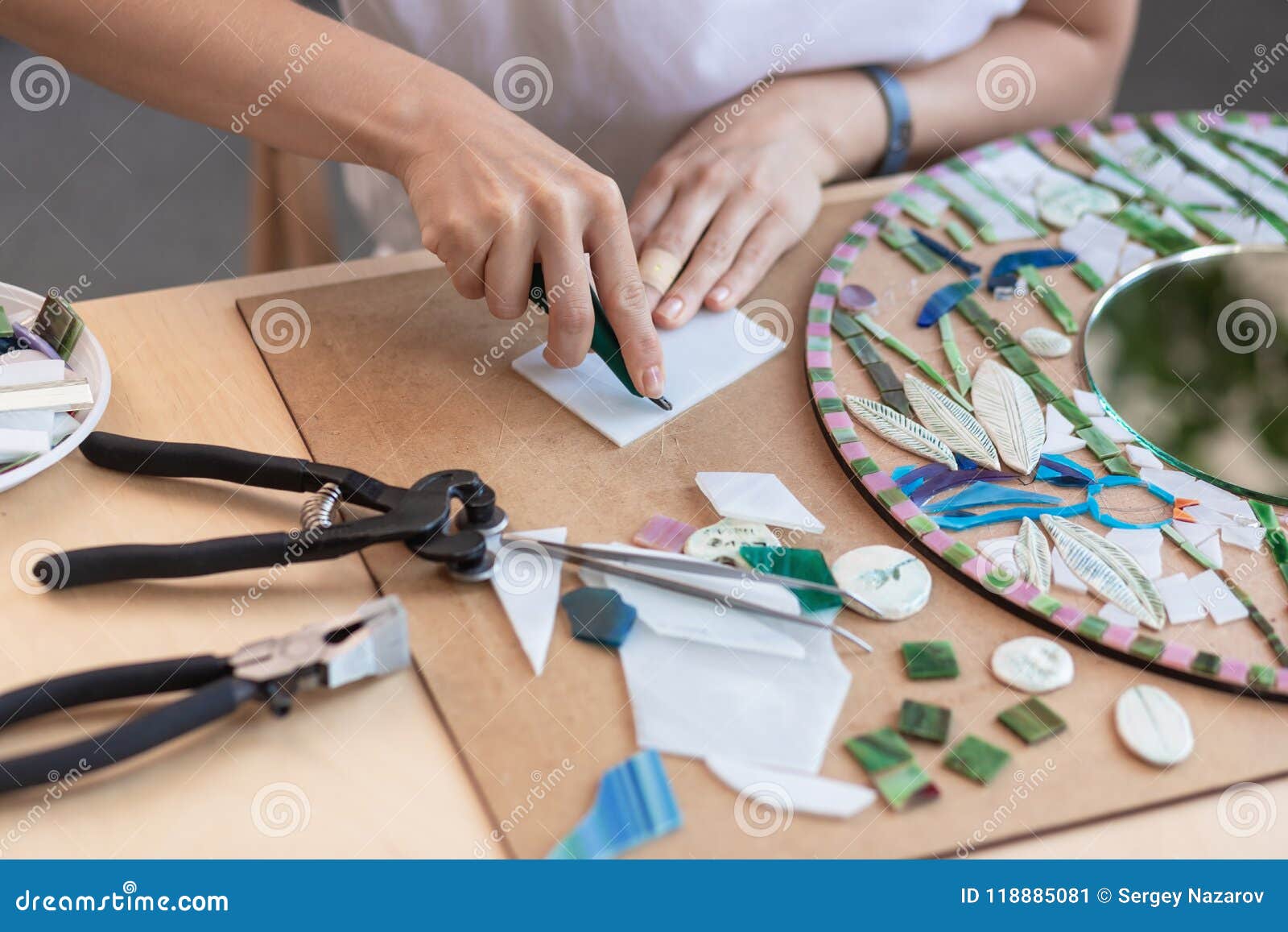 Workplace of the Mosaic Master: Women`s Hands Holding Tool for Mosaic ...