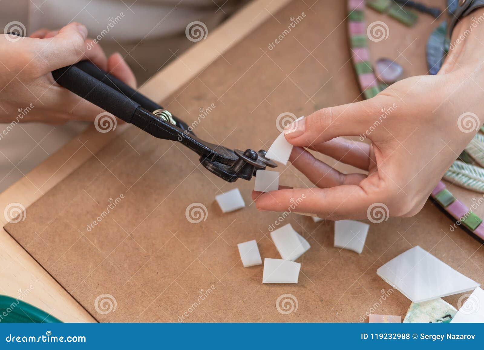 Workplace of the Mosaic Master: Women`s Hands Holding Tool for Mosaic ...